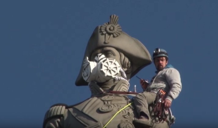 Greenpeace Activists Climb London Statues and Attach Them With Masks In ...
