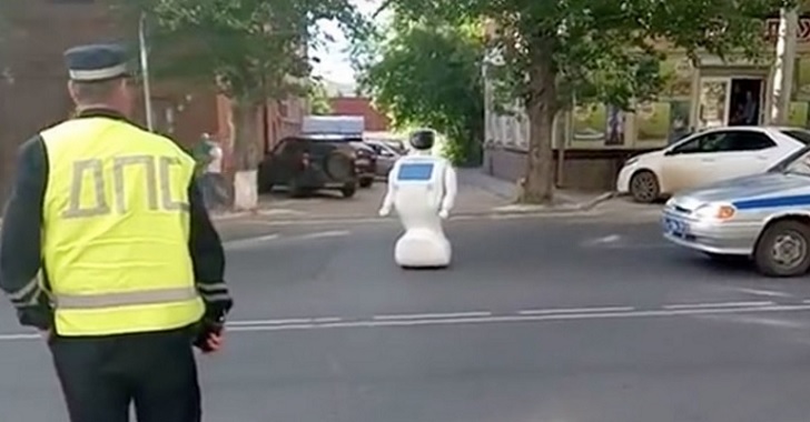 Robot Who Escaped Russian Lab Twice Has Now Been Arrested at Political ...