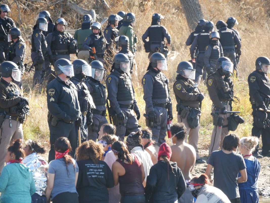 DAPL Protestors Assaulted by Police While Protecting Burial Site